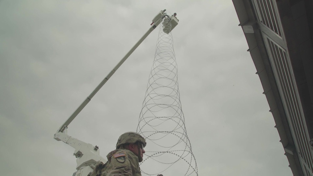 DVIDS - Video - Army Engineers Laying Concertina Wire at U.S. Entry ...