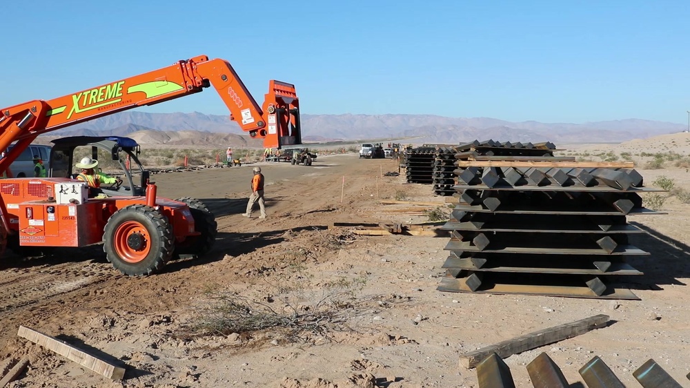 DVIDS - Video - Task Force Barrier contractors install barrier panels ...