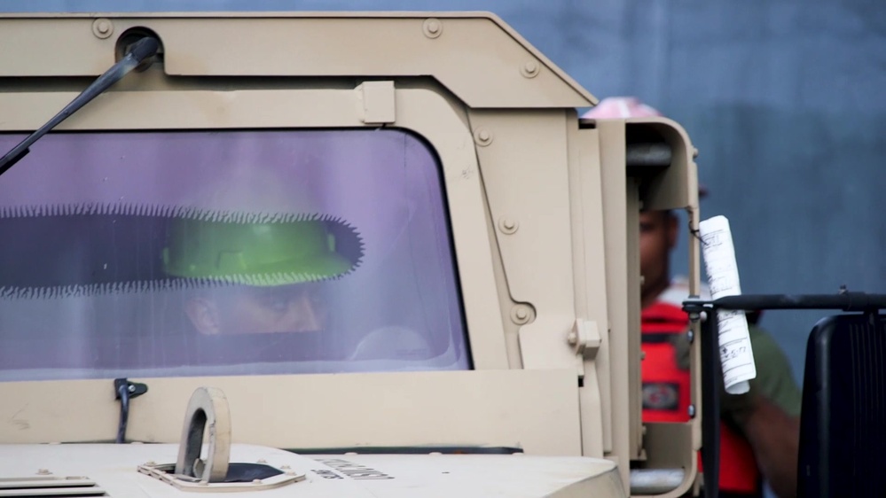 DVIDS - Video - U.S. Marines and Sailors load humvees onto the improved ...