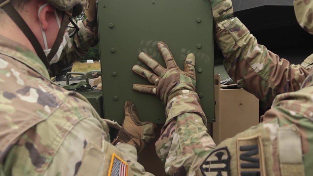 DVIDS - Video - US Military Police install ARAT tiles onto Abrams tank