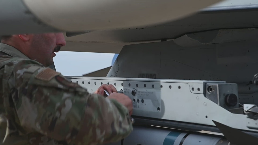 DVIDS - Video - 113th AMXS load ammunition into an F-16 aircraft