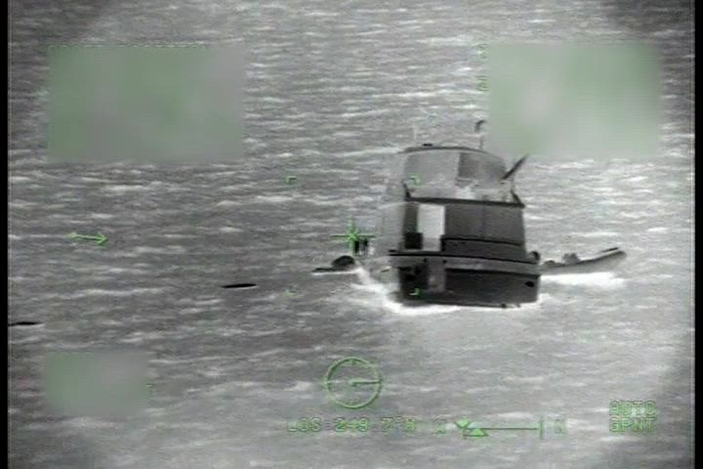 Dvids Video Coast Guard Rescues 4 Boaters From Vessel Taking On