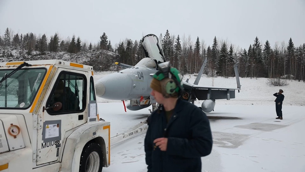 DVIDS - Video - Freezing Winds 23: Towing F/A-18 Hornets in the snow