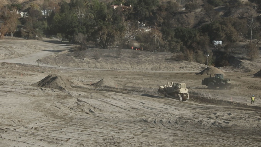 DVIDS - Video - Cal Guard's 649th Engineer Company dig into the Sierra Madre Villa Debris Basin