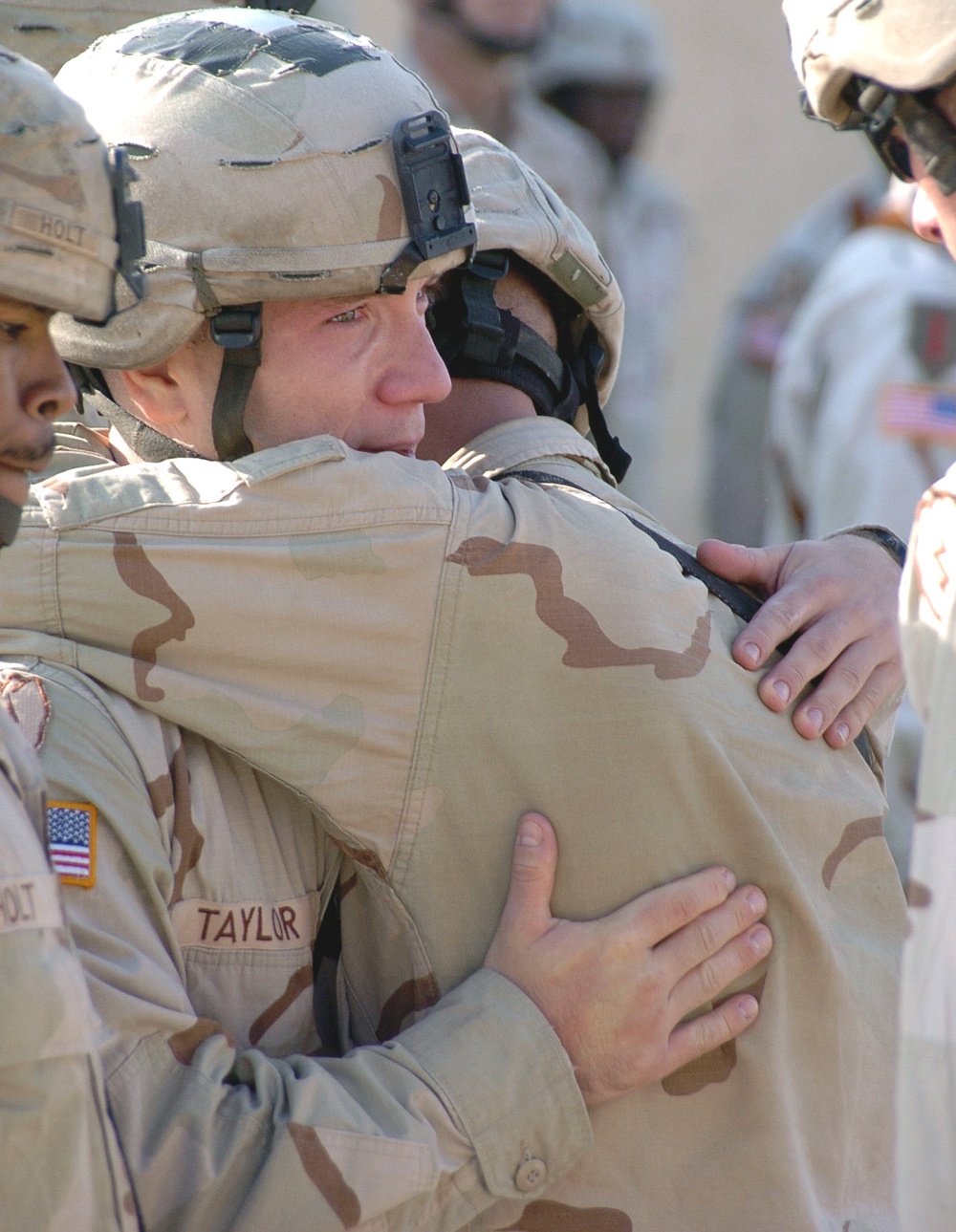 DVIDS - Images - 1st Lt. J.R. Taylor, peers over the shoulder of a ...