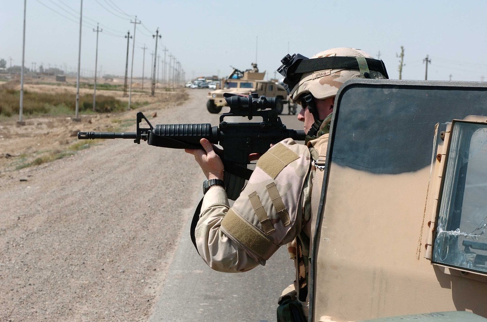 DVIDS - Images - Lt. Col. Steven Merkel pulls security during a raid ...