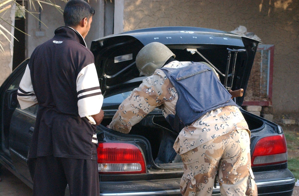 DVIDS - Images - Iraqi soldier searching a local residents car [Image 4 ...