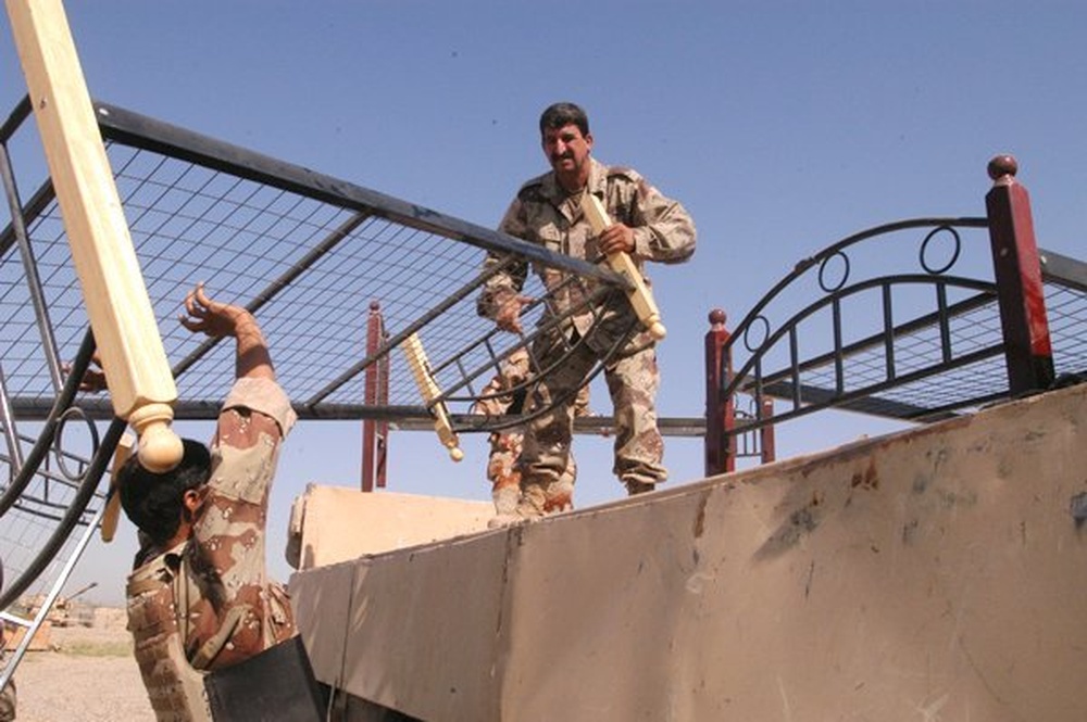 DVIDS - Images - Soldiers load beds onto an Iraqi army cargo truck ...