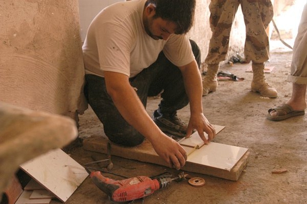DVIDS - Images - An Iraqi worker prepares a tile [Image 10 of 10]