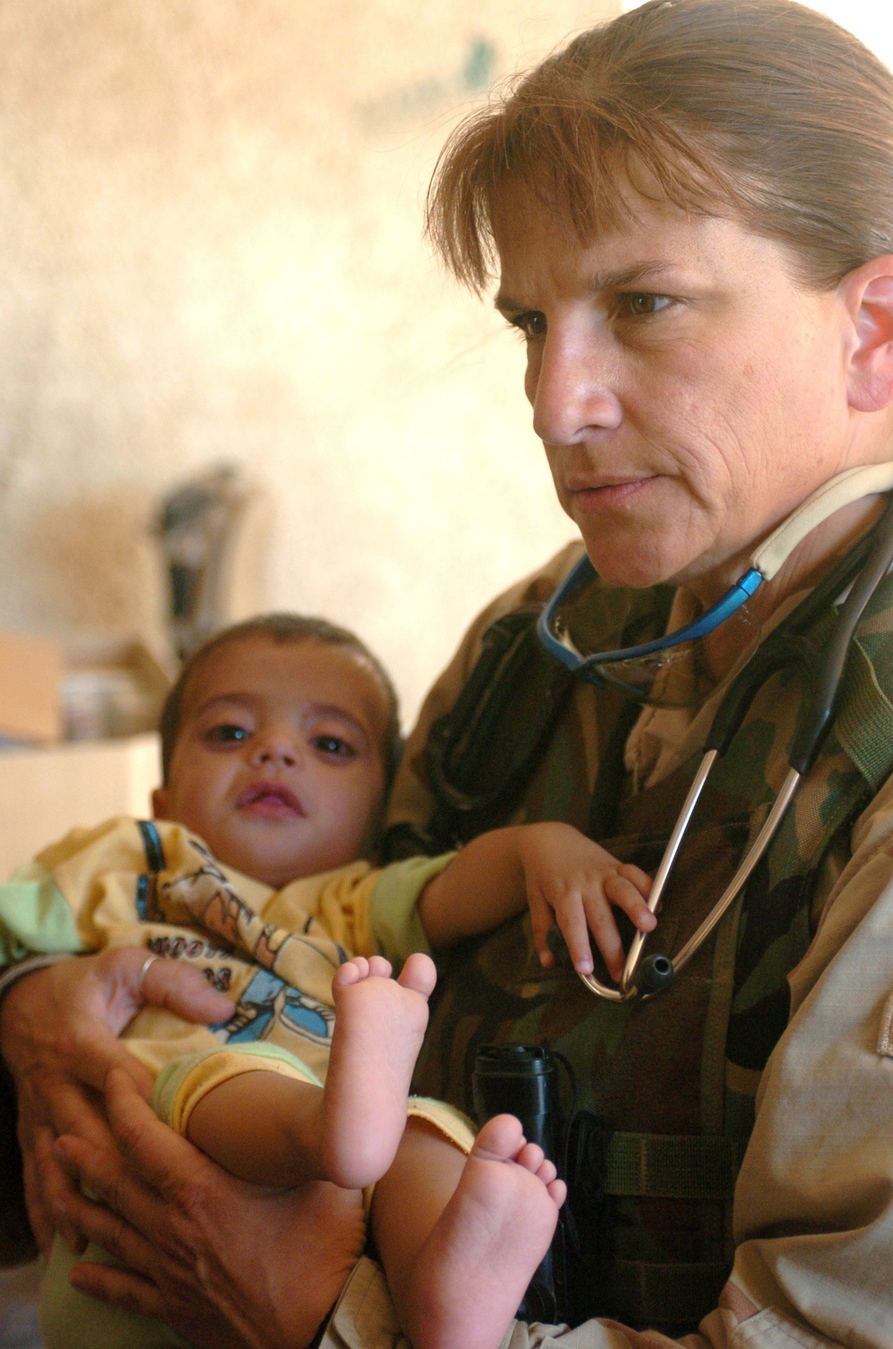 DVIDS - Images - Capt. Graul with Infant [Image 2 of 4]