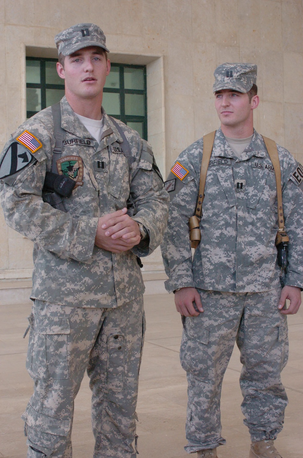 DVIDS - News - Identical twin Brothers pin on captain's bars together