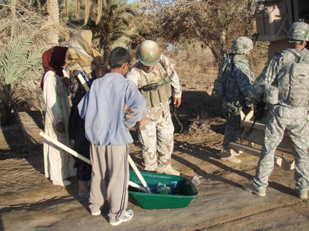 DVIDS - News - Soldiers help displaced farmers rebuild community