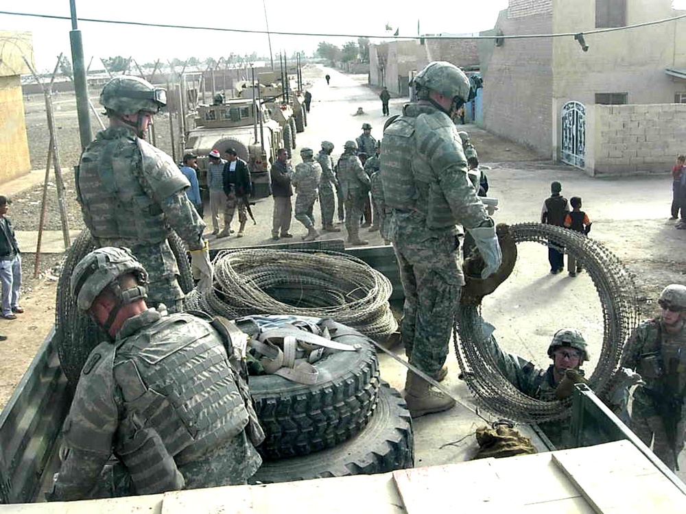 DVIDS - News - Field Artillery Soldiers build hope in Assriya