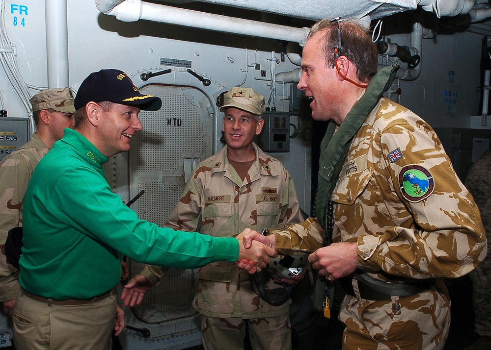 DVIDS - Images - Capt. Brian Luther greets Royal Navy Commodore Duncan ...