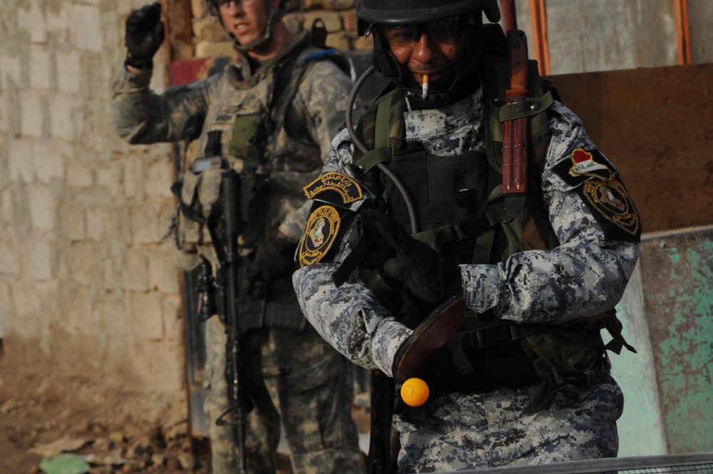 DVIDS - Images - Iraqi national police, U.S. Soldiers hand out ...