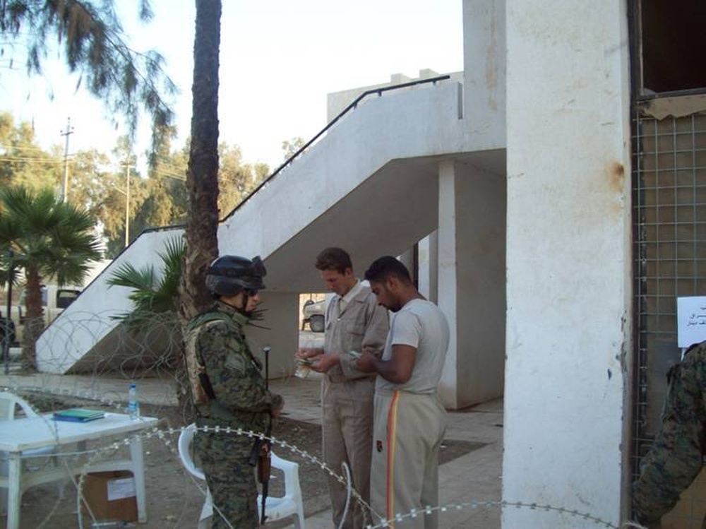 DVIDS - News - Second day of payment for Salman Pak Sons of Iraq by ...