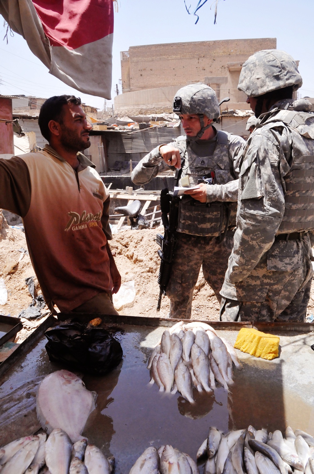 DVIDS - News - Warhorse Soldiers visit fish market, assess construction ...