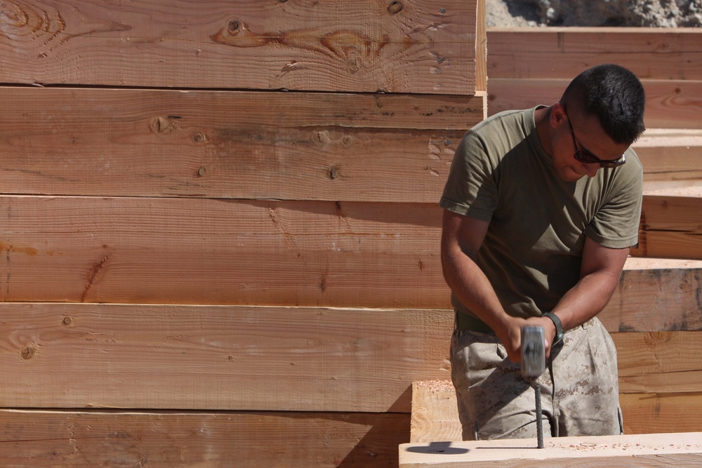 DVIDS - News - Range/Training Area Maintenance Section repairs roads ...