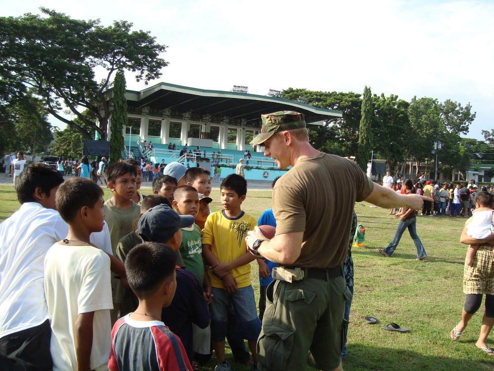 DVIDS - News - AFP and JSOTF-P Bring Smiles to Children's Fun Day