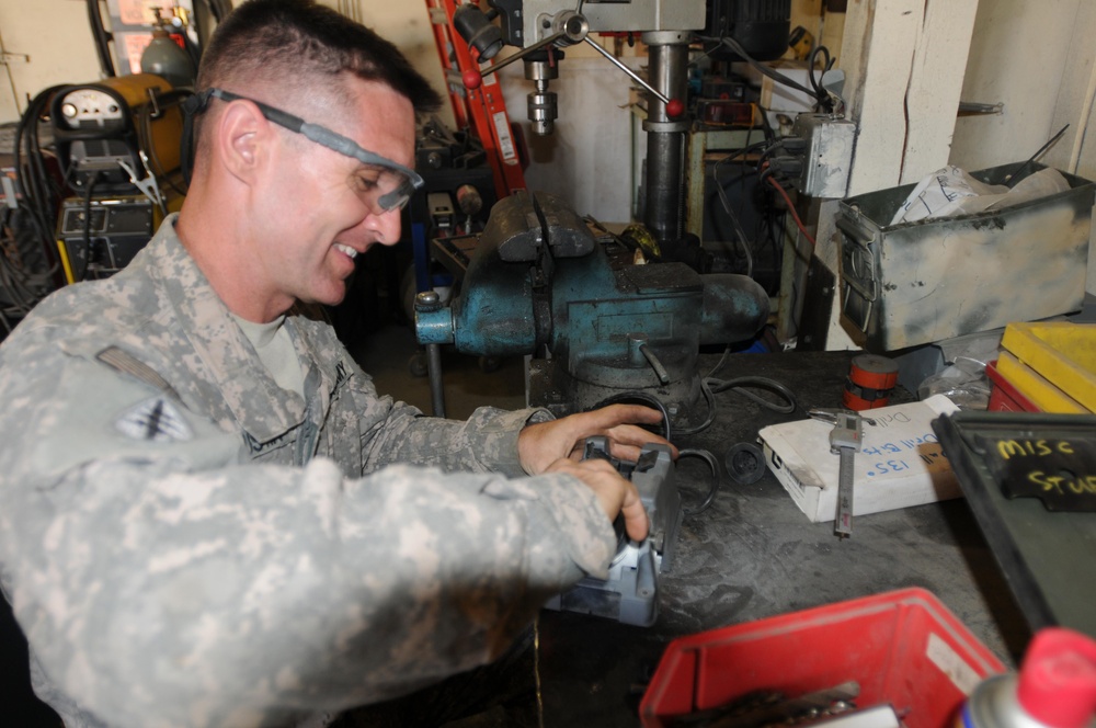 DVIDS - Images - Soldiers get greasy on Camp Montrond [Image 1 of 5]