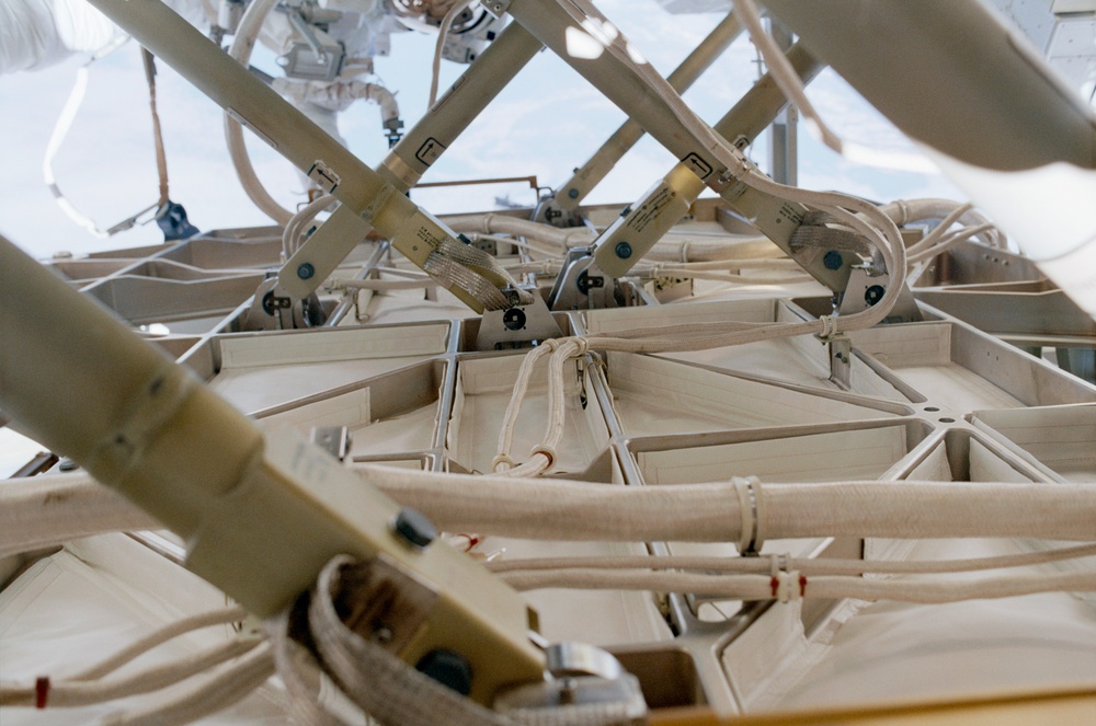 DVIDS - Images - MS Curbeam works along the P6 Truss during EVA