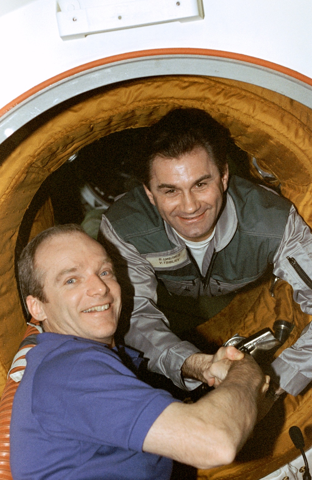 DVIDS - Images - Various candid views of STS-84 crew after hatch opening