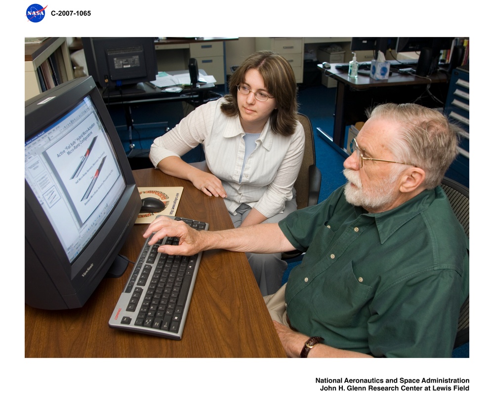 DVIDS - Images - Two Aerospace Engineers examine flow diagram for ...