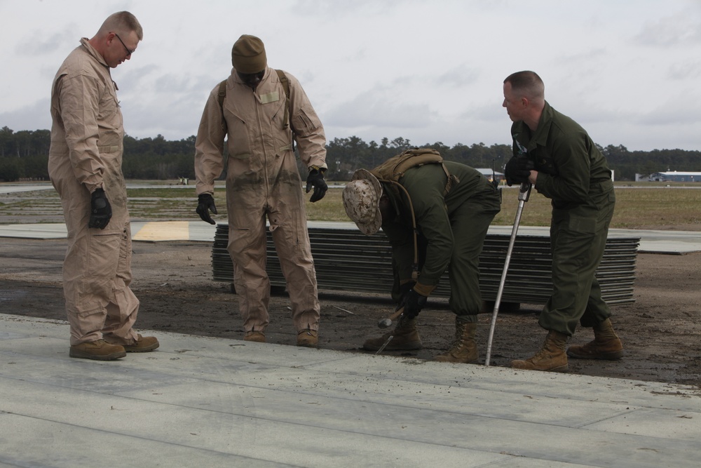 DVIDS - News - ’271 Marines ‘break backs’ to replace flight line