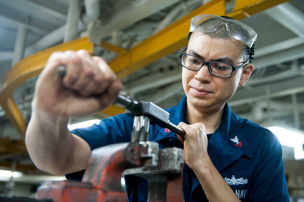 DVIDS - Images - USS Harry S. Truman sailor threads pipe fitting