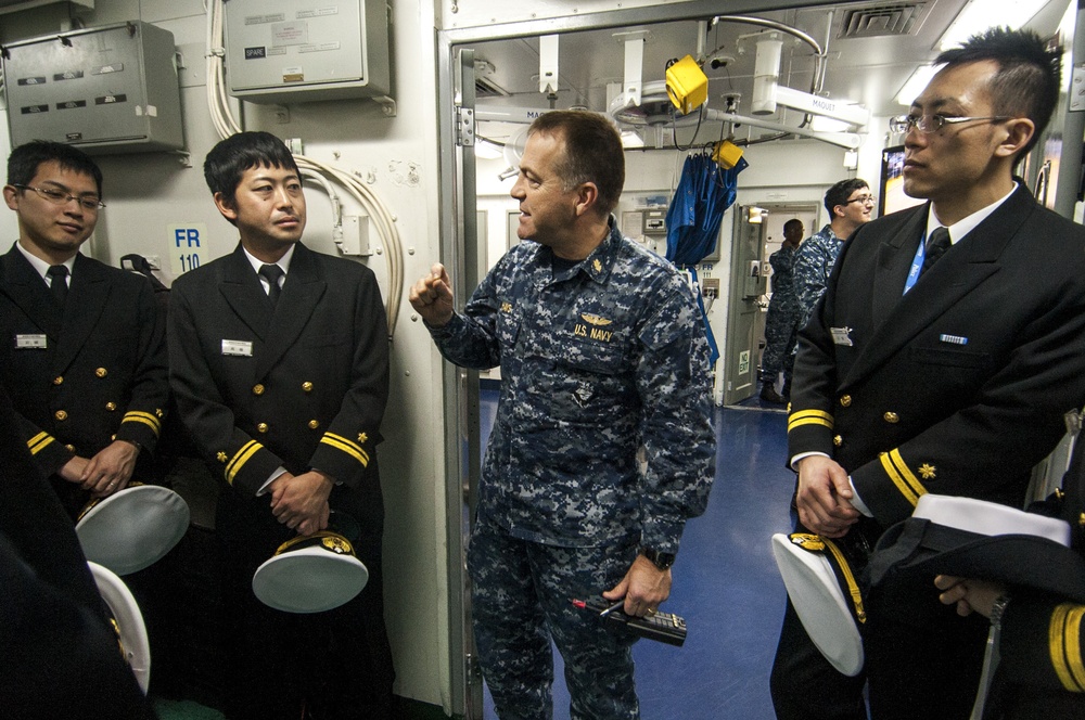 DVIDS - Images - JMSDF officers tour USS George Washington [Image 1 of 2]