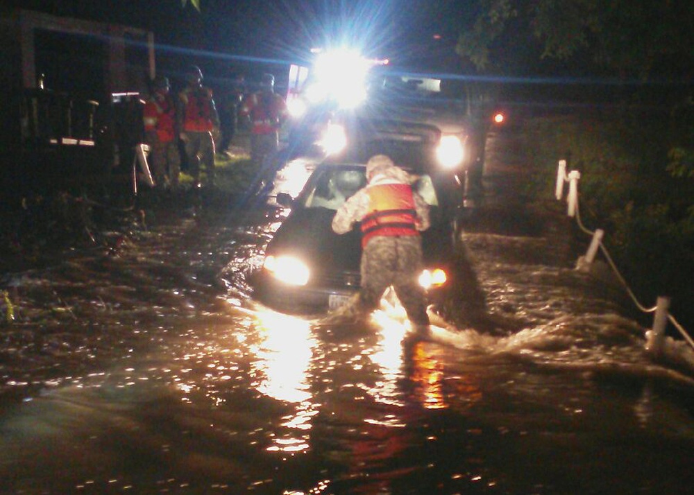 DVIDS - News - Texas Guardsmen rescue family from flooding waters