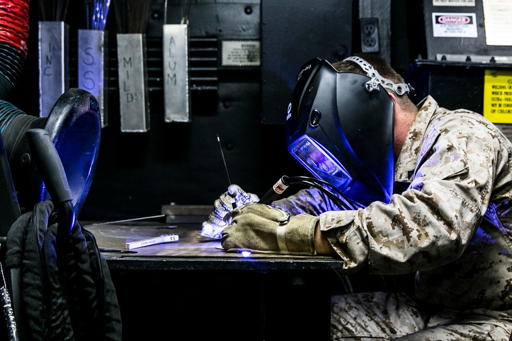 DVIDS - Images - One Team, One Fight: AIMD Marines improve living ...