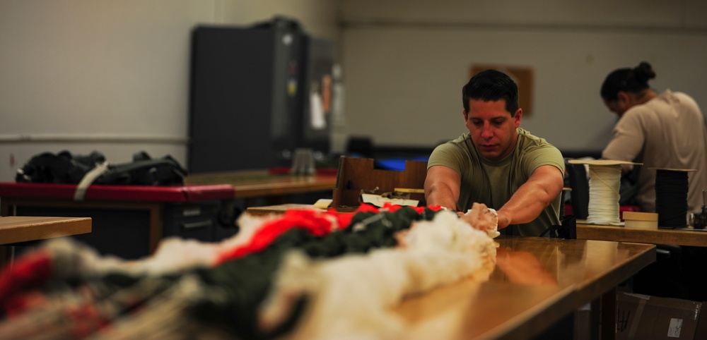 DVIDS - Images - Parachute packers ensure a safe and sustained landing ...