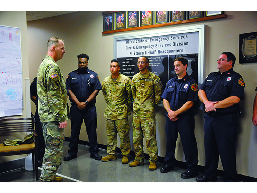 DVIDS - News - Fort Stewart Garrison Commander coins firefighters