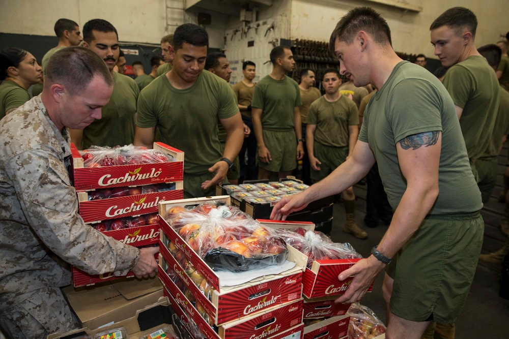 DVIDS - Images - Marines and Sailors receive food supplies and mail ...