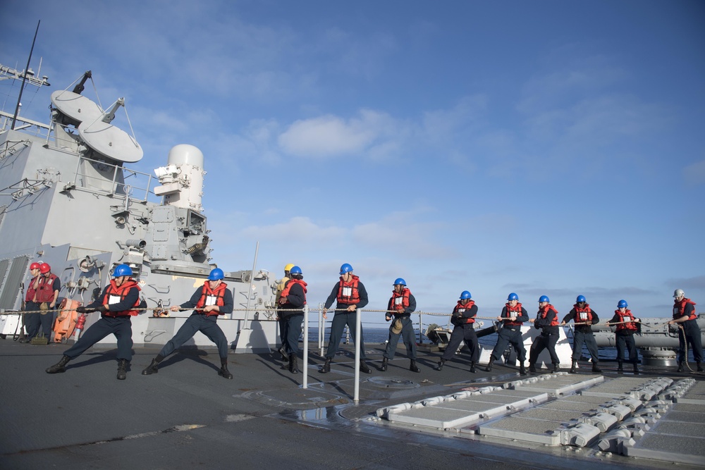 DVIDS - Images - Sailors aboard USS Spruance (DDG 111) heave in line on ...