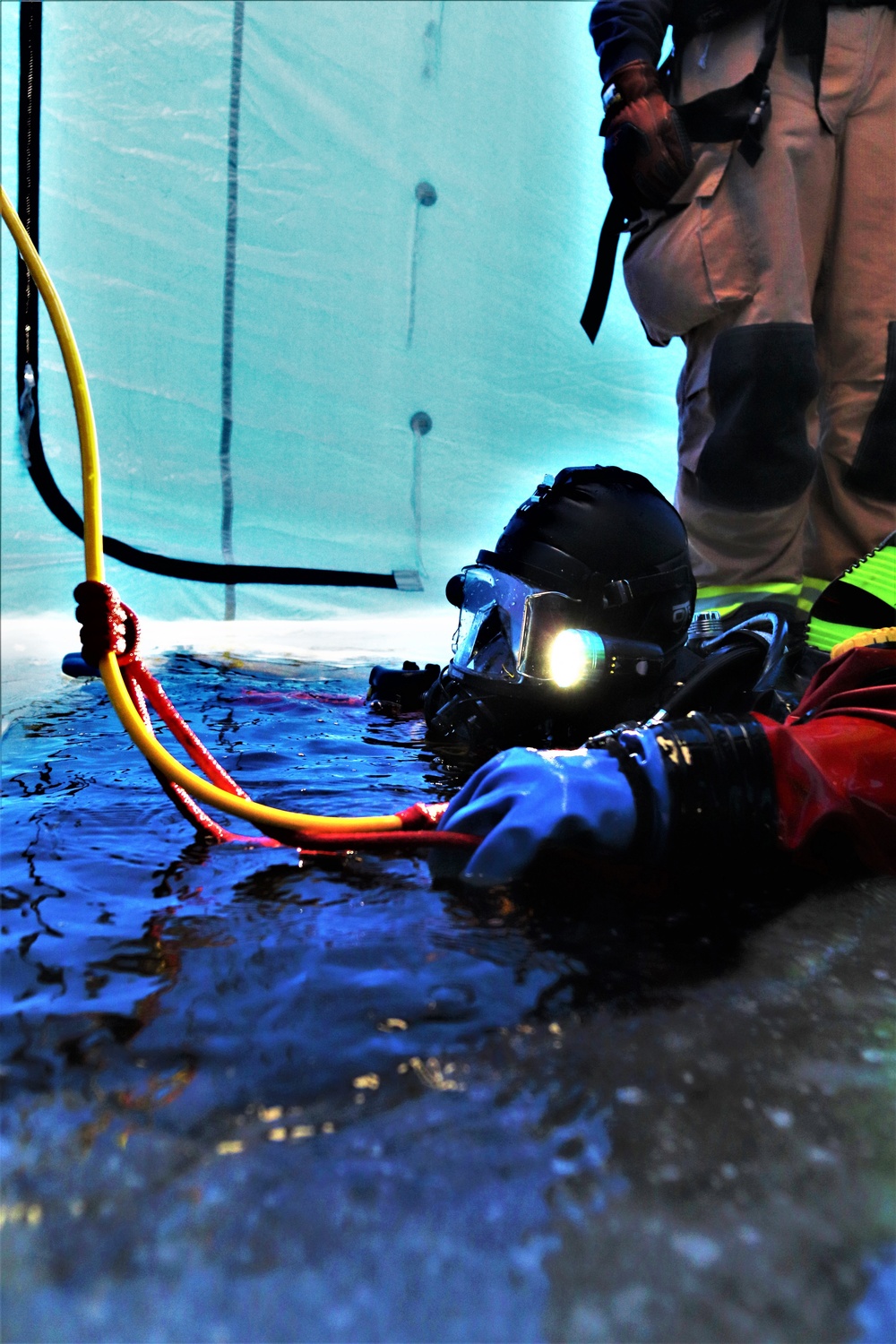 DVIDS - Images - Fort McCoy firefighters practice diving under ice for ...