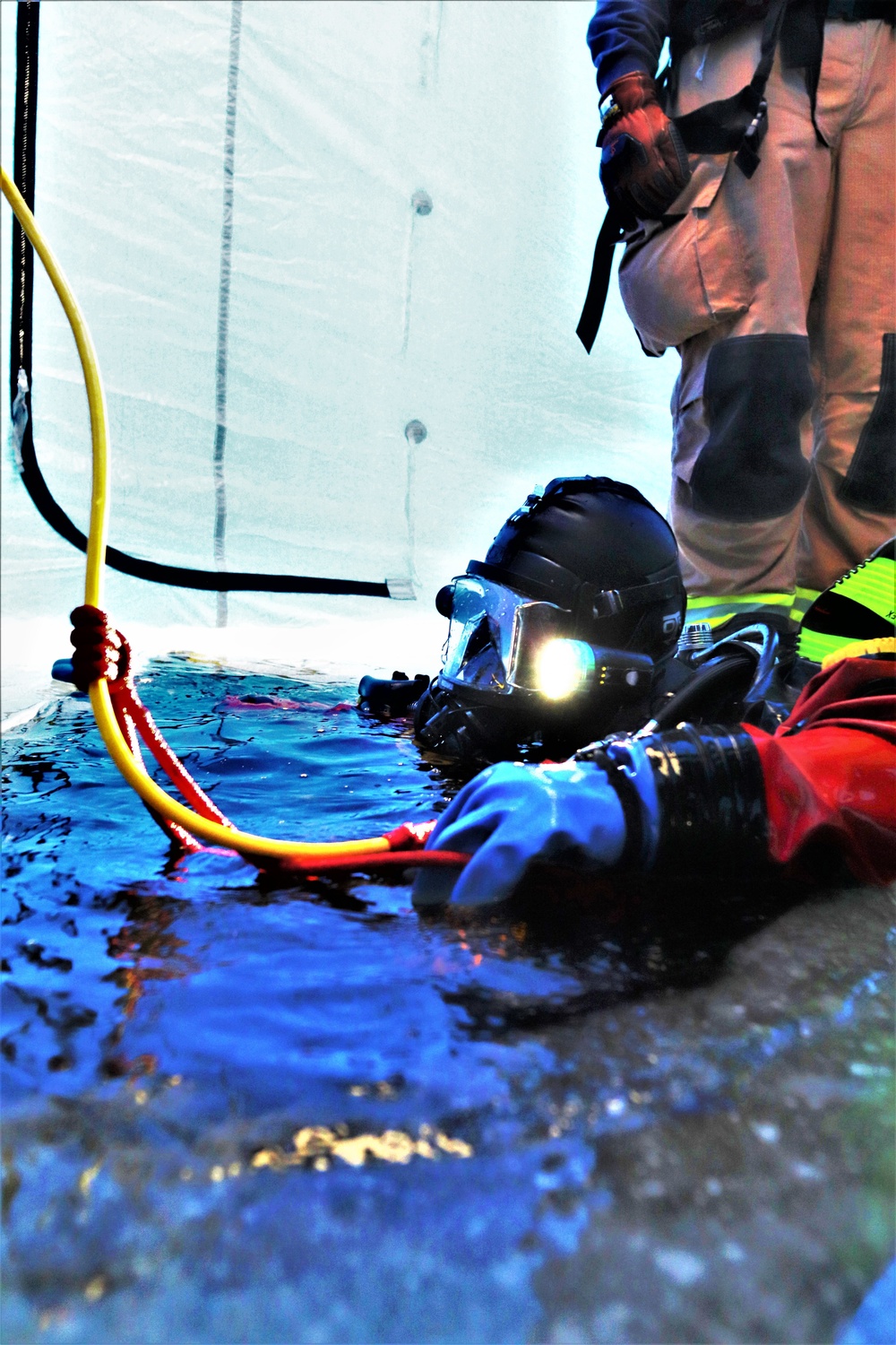DVIDS - Images - Fort McCoy firefighters practice diving under ice for ...