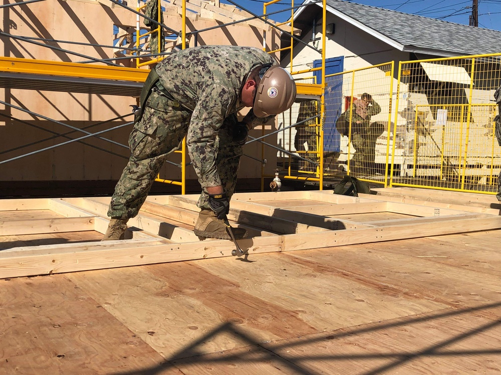 DVIDS - Images - NMCB-5 Builds SEA huts for NEMTI [Image 3 of 3]