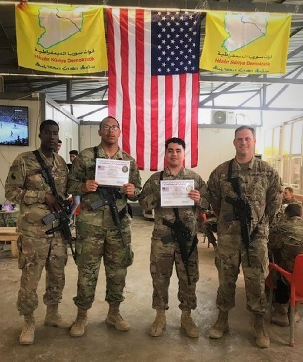 DVIDS - Images - Spc. Lawson Leavell and Pfc. Zequan Dowdell receive ...