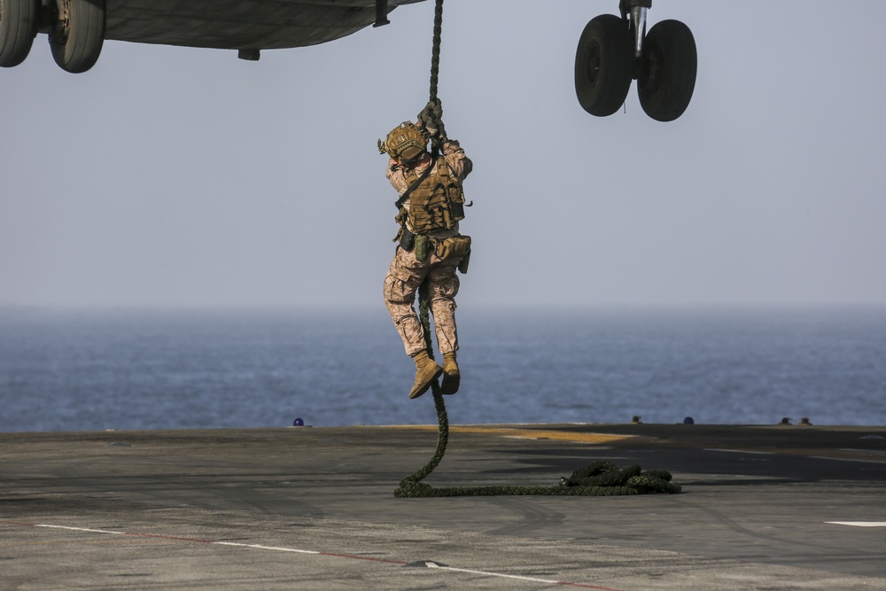 DVIDS - Images - Maritime Raid Force fast-ropes aboard USS Bataan ...