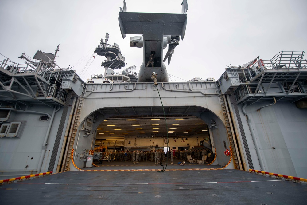 DVIDS - Images - Marines aboard USS America (LHA 6) Perform A Fast Rope ...