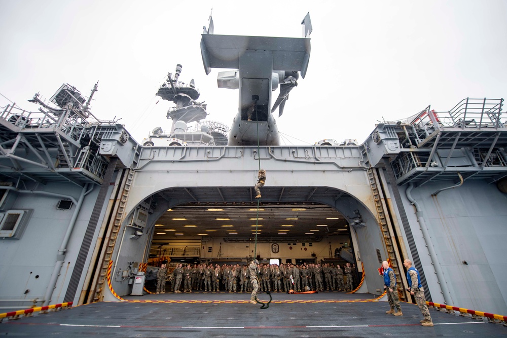 DVIDS - Images - Marines aboard USS America (LHA 6) Perform A Fast Rope ...