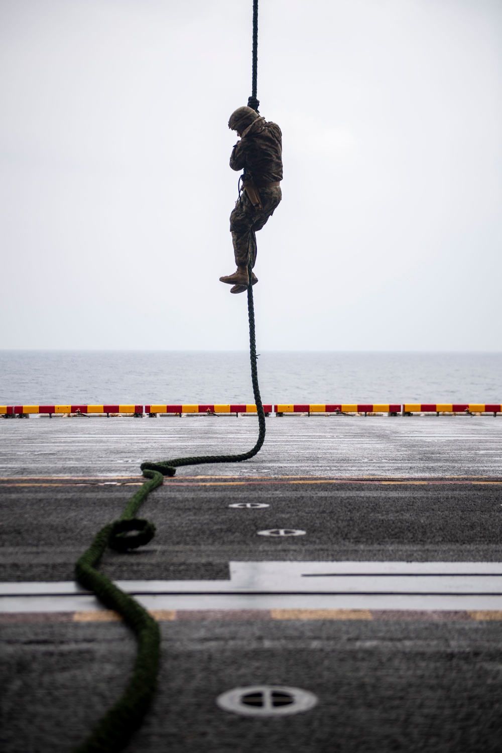 DVIDS - Images - Marines aboard USS America (LHA 6) Perform A Fast Rope ...