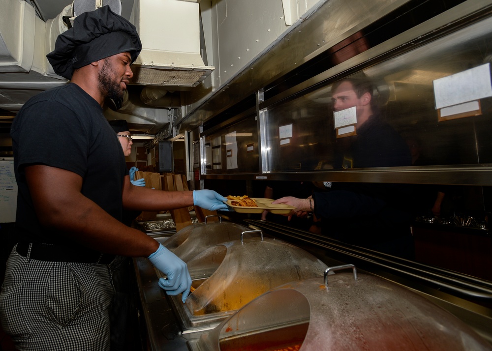 DVIDS - Images - Nimitz Sailor Serves Chow [Image 1 of 4]