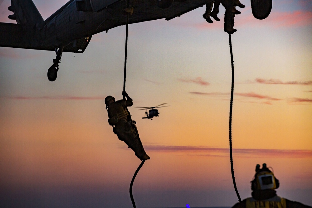 DVIDS - Images - 15th MEU Marines fast-rope from a helicopter onto USS ...