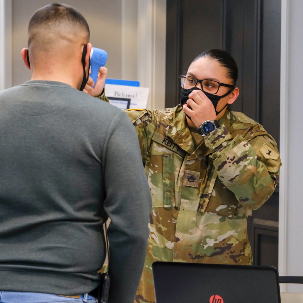 DVIDS - Images - Army personnel begin in-processing for COVID ...