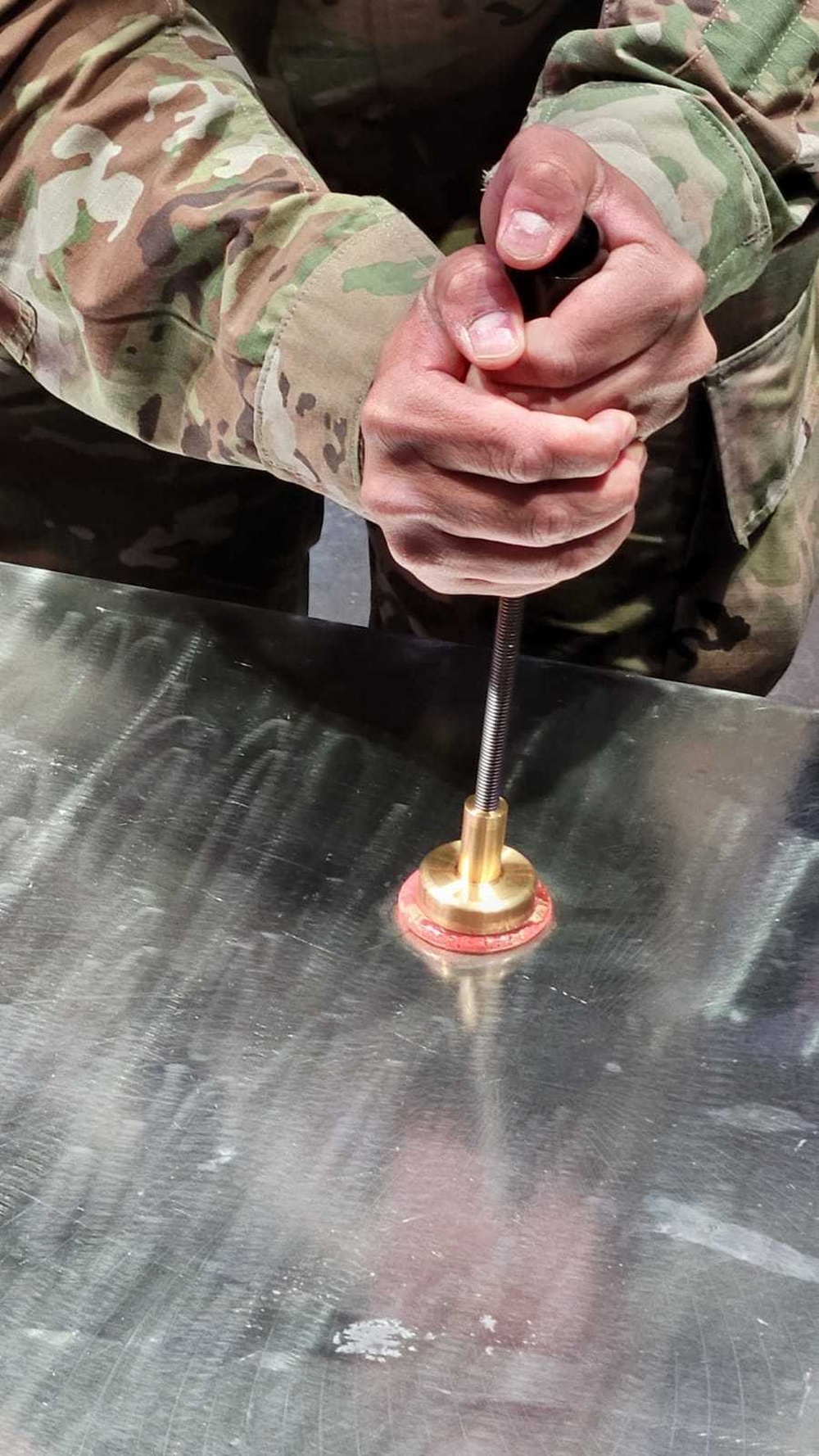 DVIDS - News - Glass museum hand crafts glass challenge coins for NY ...