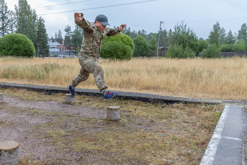 DVIDS - Images - Col. Ryan “MZ” Montanez steps over an obstacle [Image ...