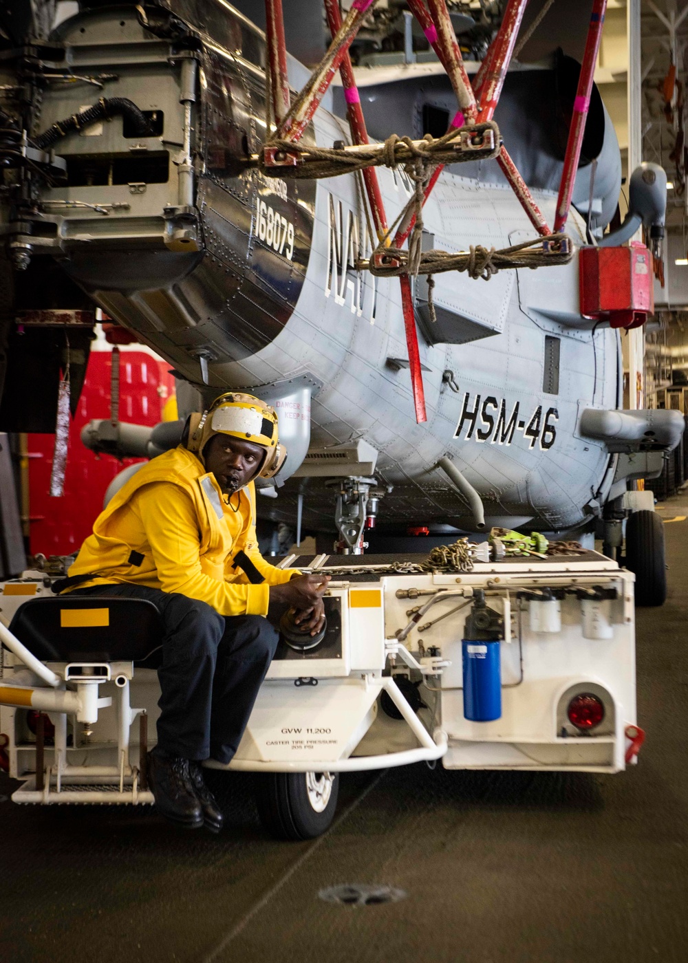 DVIDS - Images - GHWB Sailor Repositions Aircraft [Image 1 of 3]